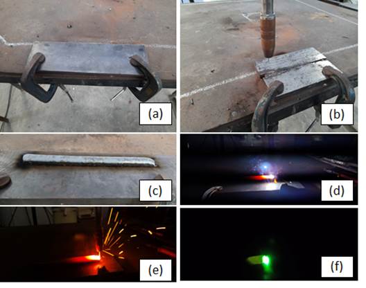Fabrication stages (a) Back plate being clamped to the welding table ...